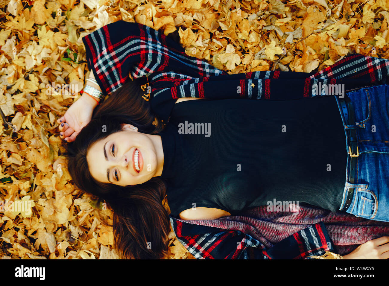 Stylish walking through city park hi-res stock photography and images ...