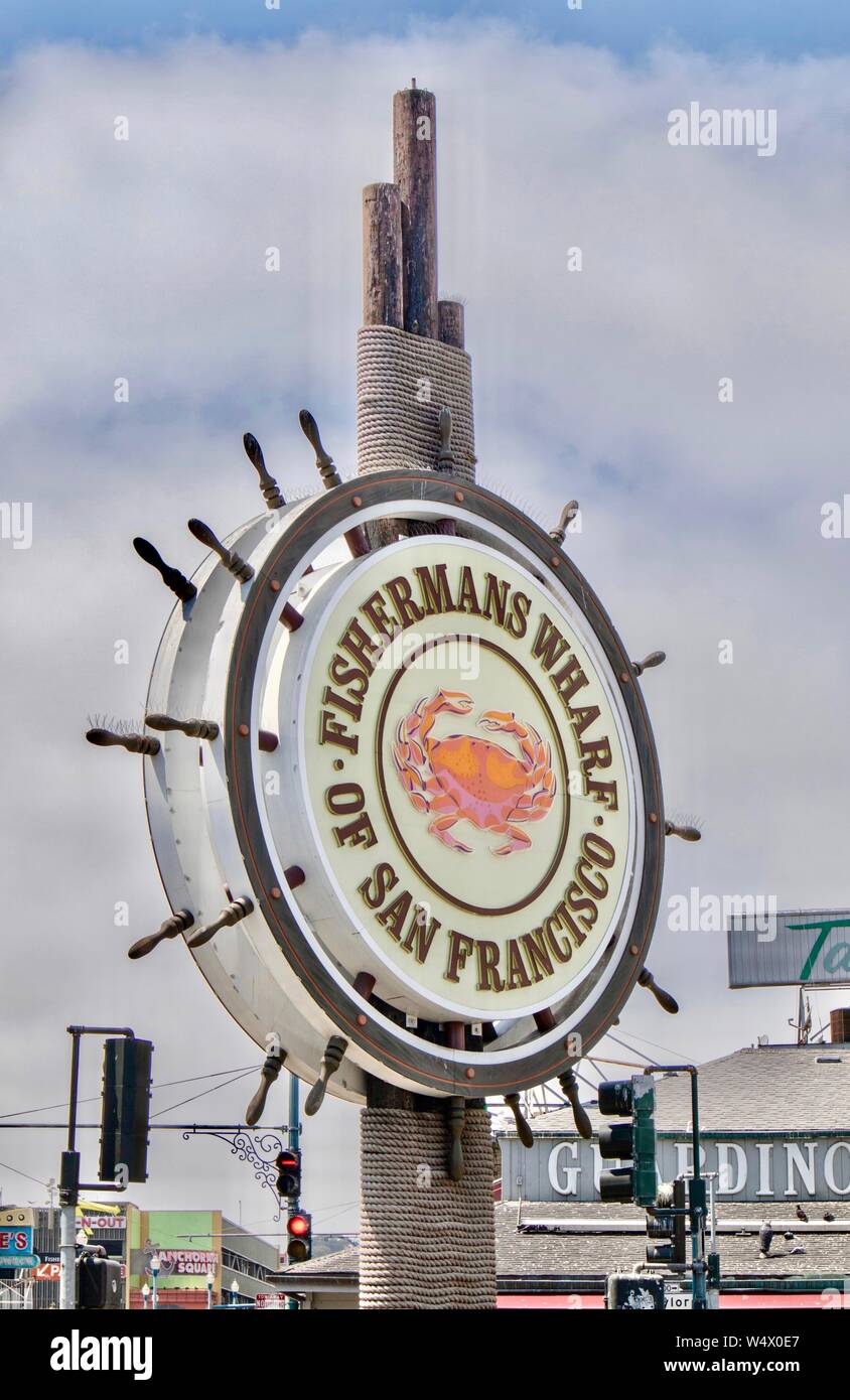 Fishermans wharf sign against blue sky Stock Photo - Alamy