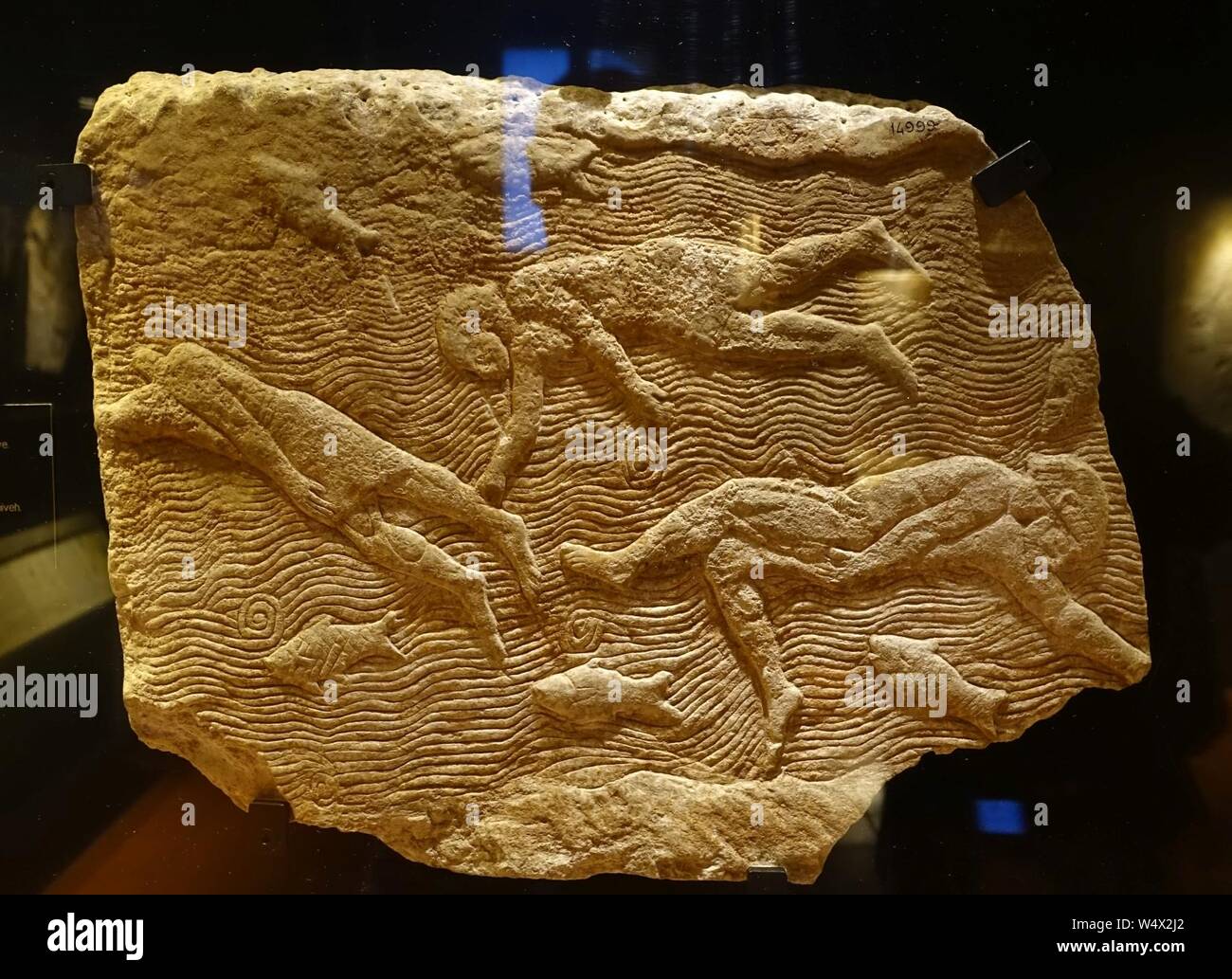 Corpses floating on a river, from the North Palace of Ashurbanipal at ...