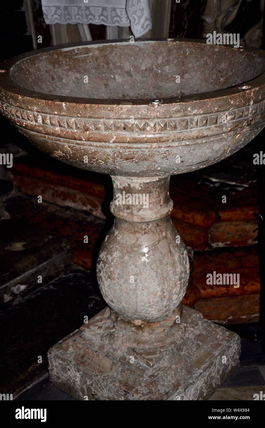 Ancient holy water font hi-res stock photography and images - Alamy
