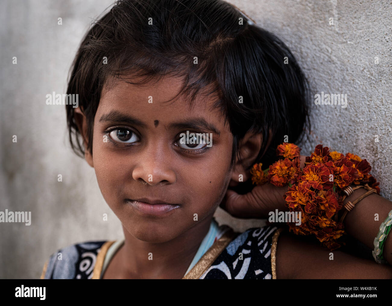 VARANASI, INDIA - CIRCA NOVEMBER 2018: Portrait of girl from a fishing ...