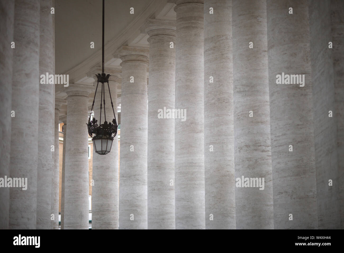 Lantern in the architectural complex among the columns in the Vatican ...