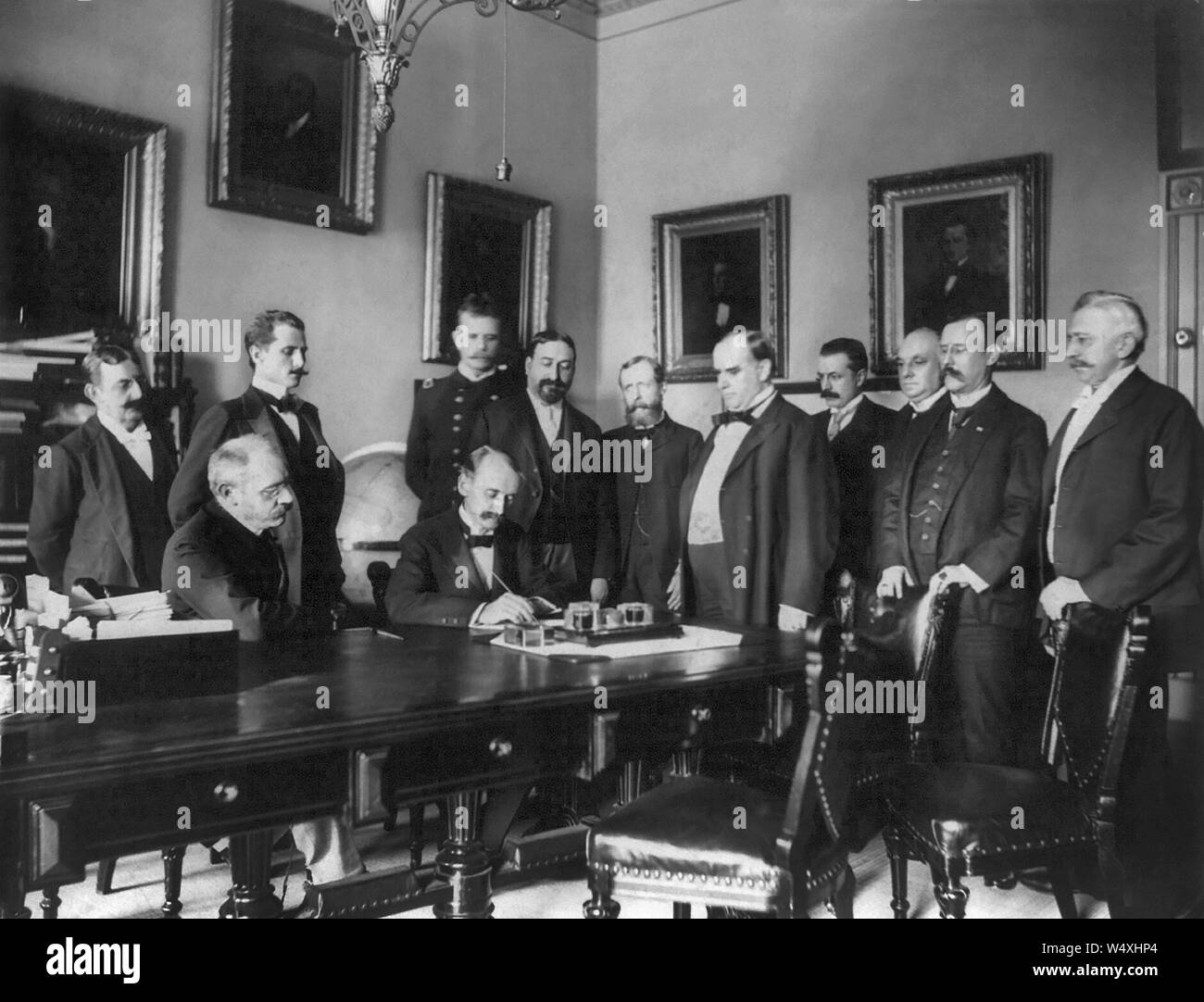 U.S. President William McKinley Looks on as Peace Protocol is Signed ...
