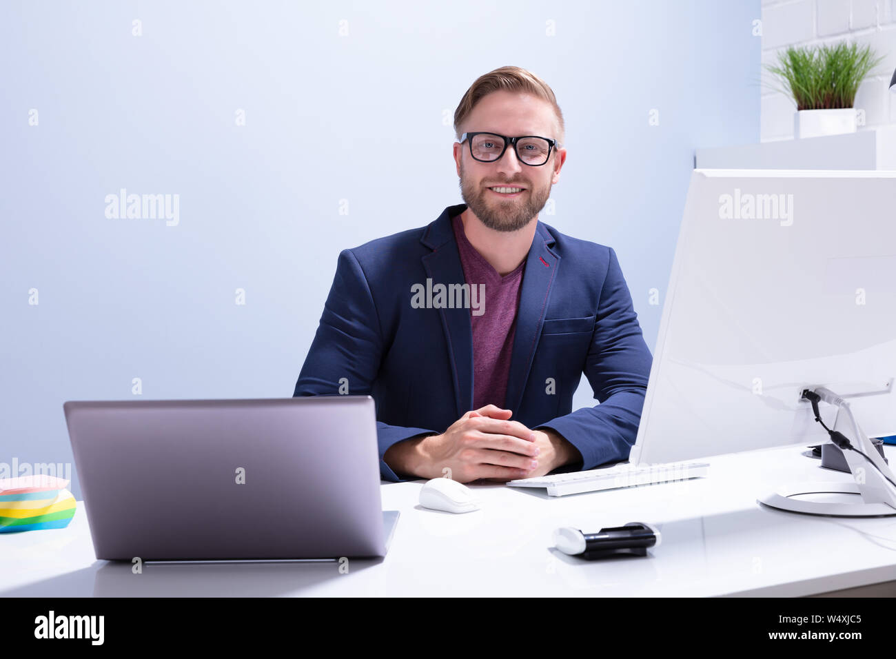 Person sitting in front of computer hi-res stock photography and images ...