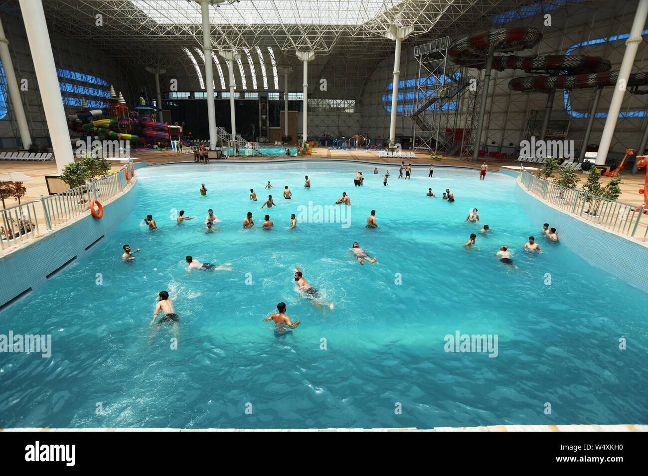 Baghdad. 25th July, 2019. People cool off at a water park in Baghdad ...