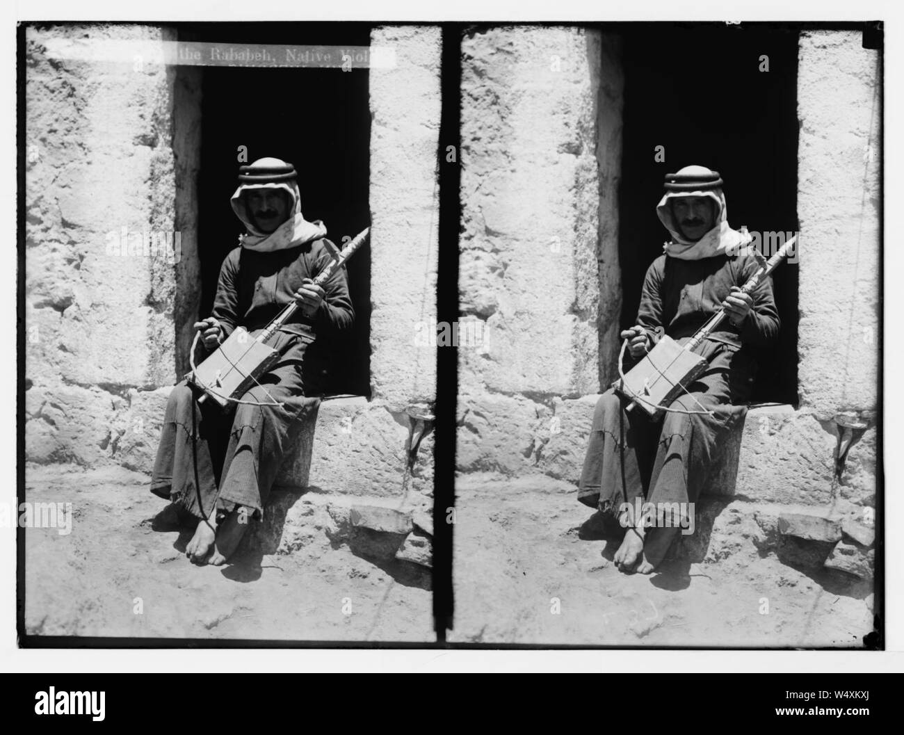 Costumes, characters, etc. Playing the Rababeh, native violin Stock ...