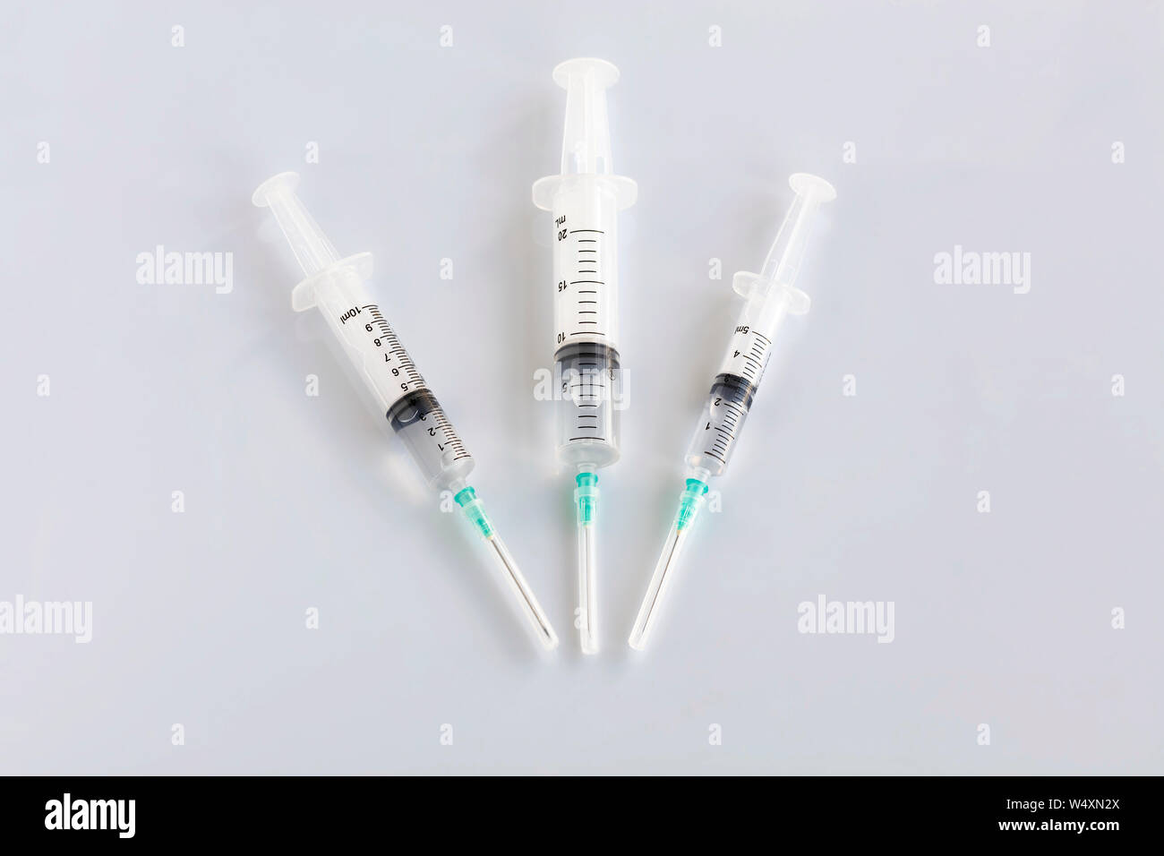 Three syringes of different capacity on the table in the hospital ...