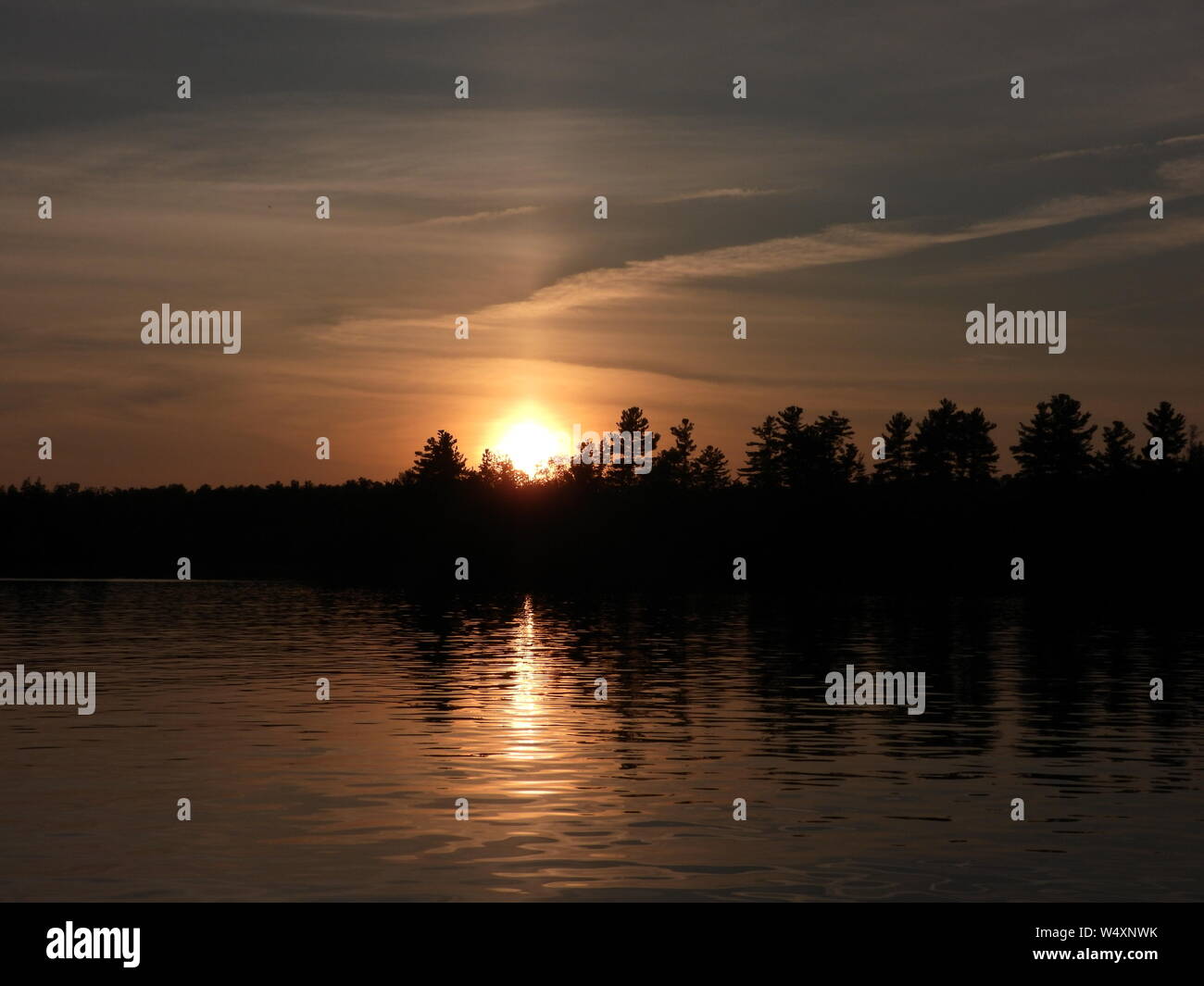 Sunset water photos hi-res stock photography and images - Alamy