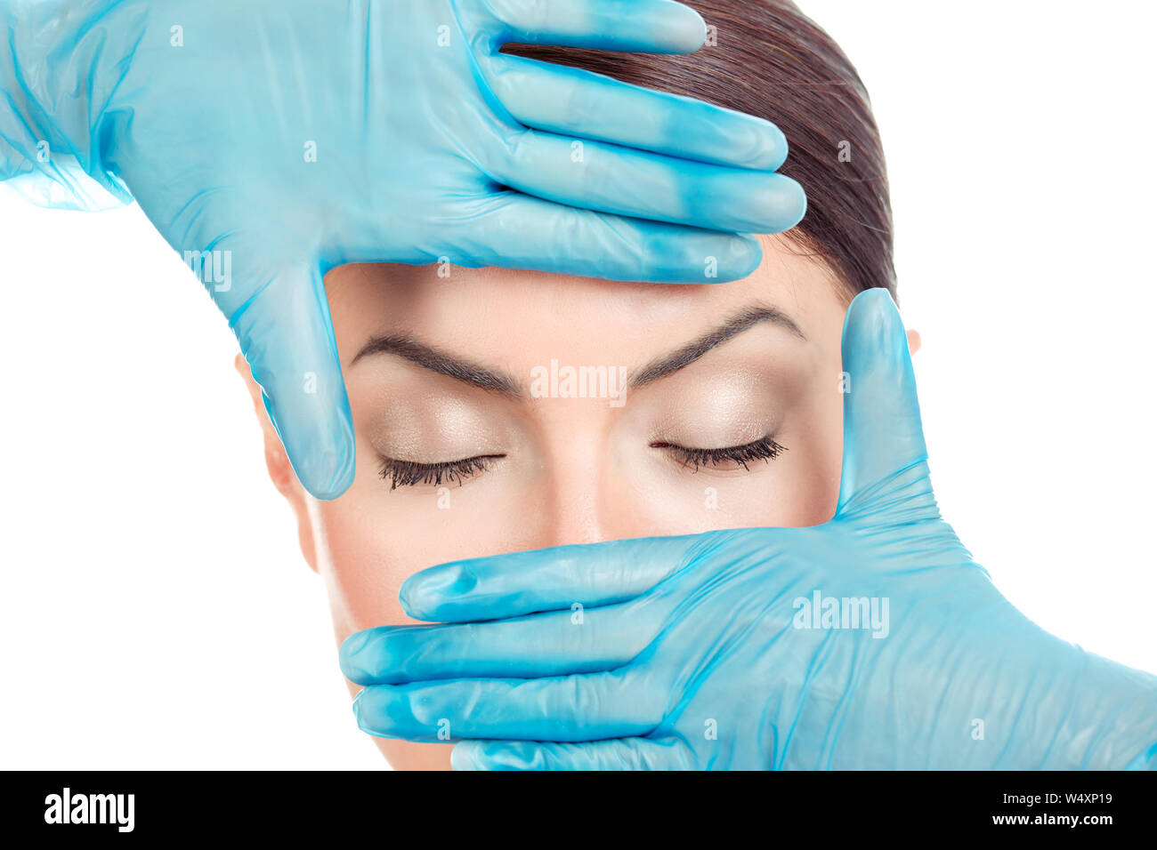 Fingers around eyes hi-res stock photography and images - Alamy