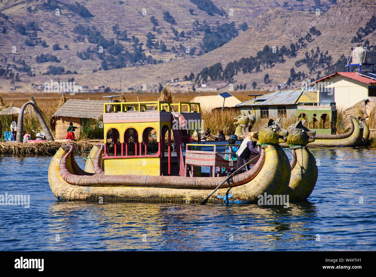 Traditional reed boat of the Uros islands, Lake Titicaca, Puno, Peru ...
