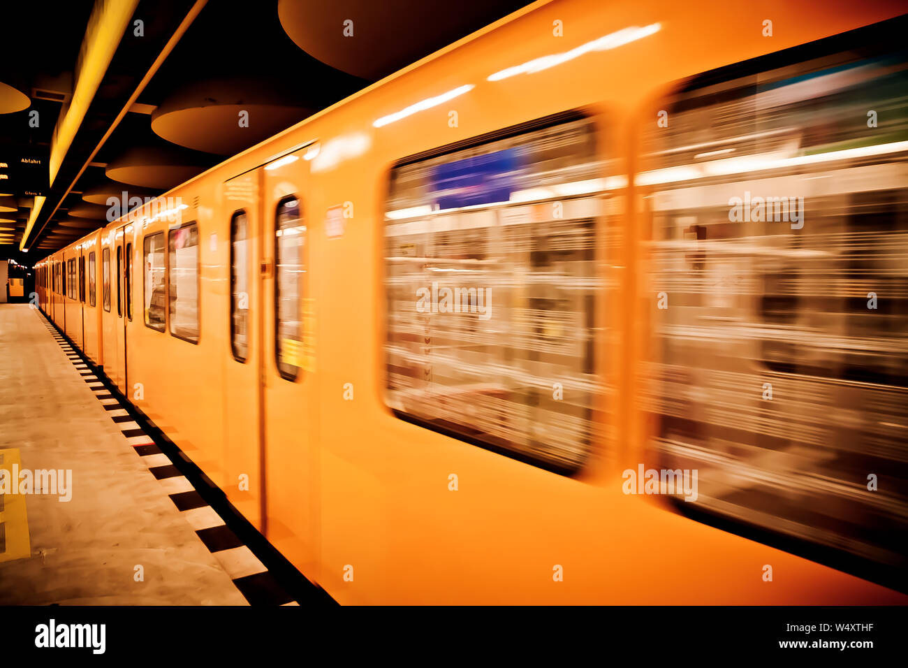 A yellow train of the subway in Berlin Stock Photo - Alamy