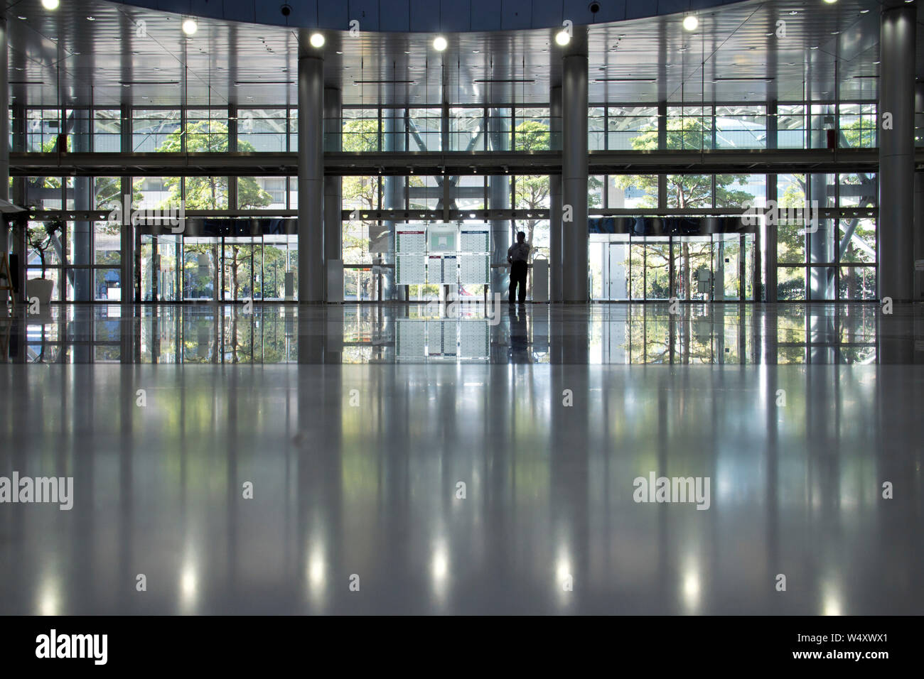 Lobby of Modern Office Building with View to Street Through Large Glass ...