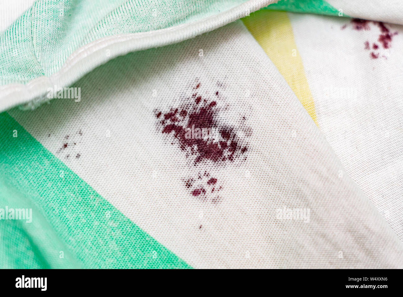 Red wine stain on clothes hi-res stock photography and images - Alamy