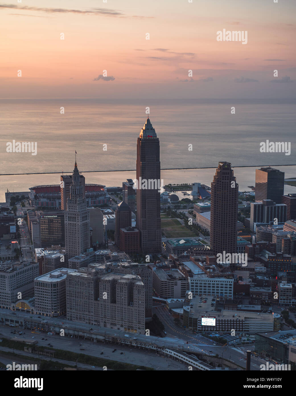 Aerial view of the cleveland skyline from a helicopter at sunset hi-res ...