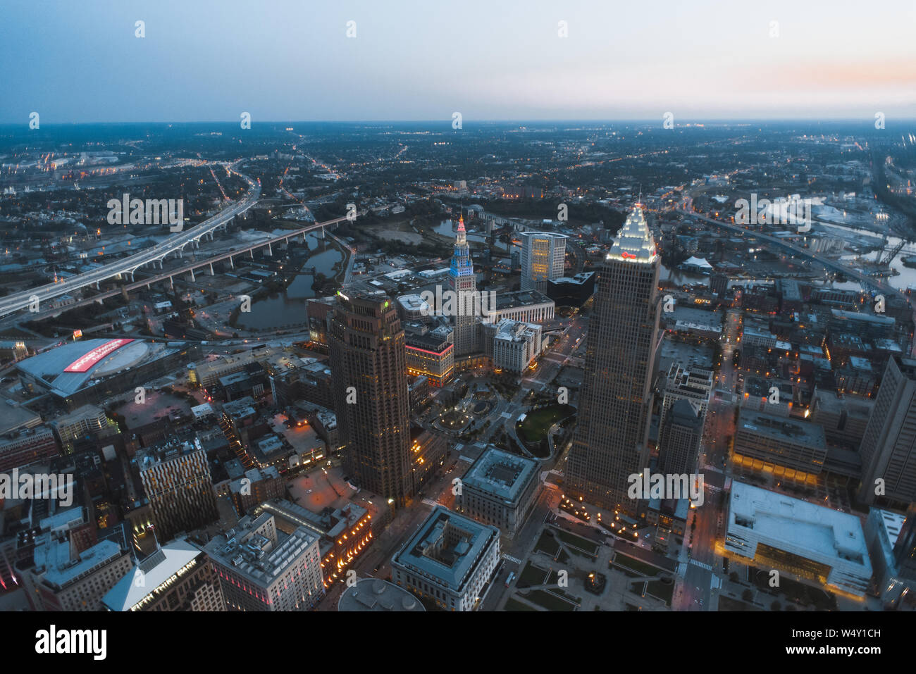 Aerial view of the cleveland skyline from a helicopter at sunset hi-res ...