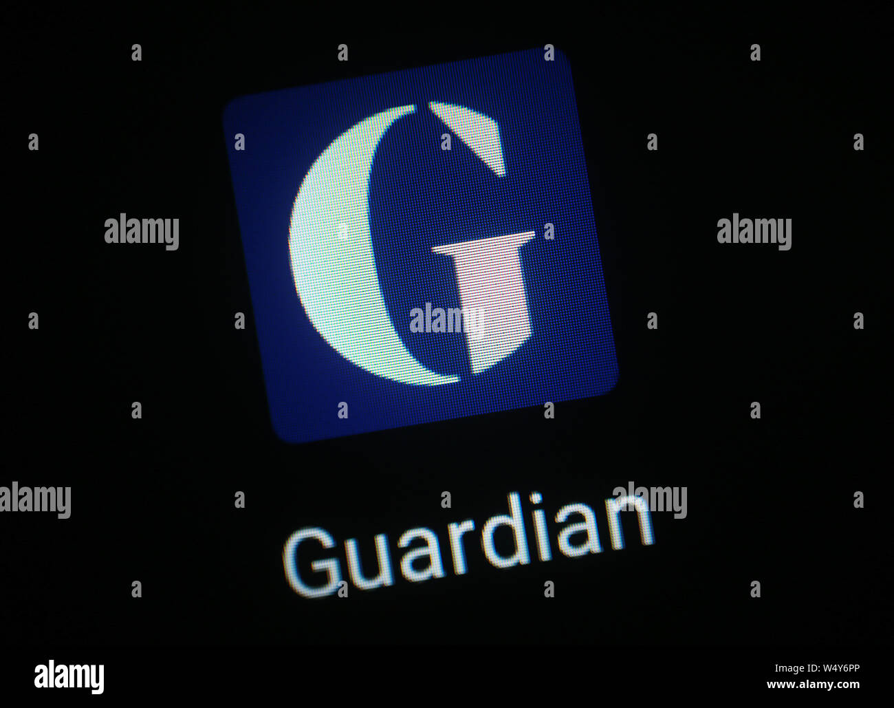 The Guardian newspaper application icon on computer display Stock Photo ...