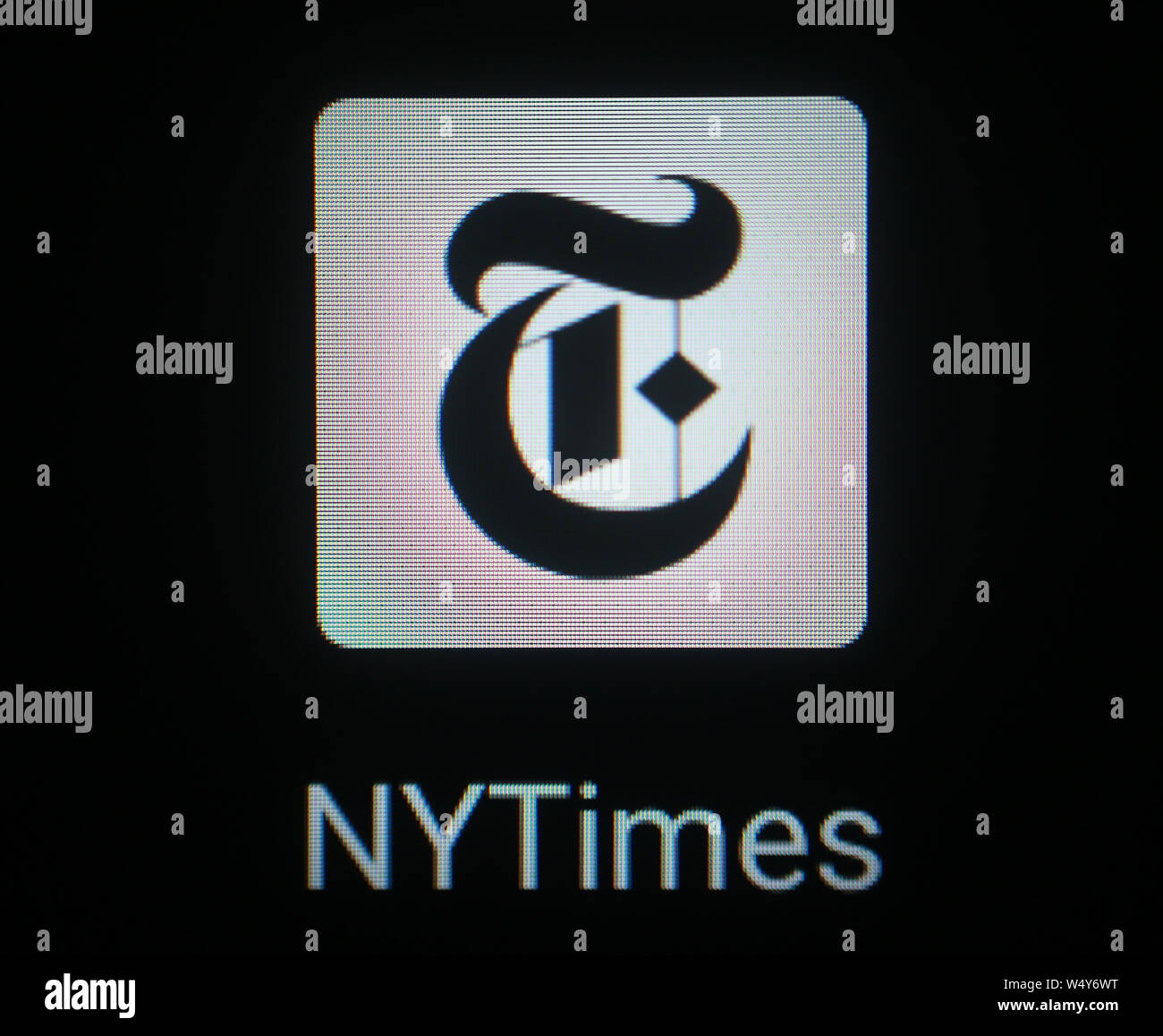 The New York Times newspaper application icon on computer display Stock ...