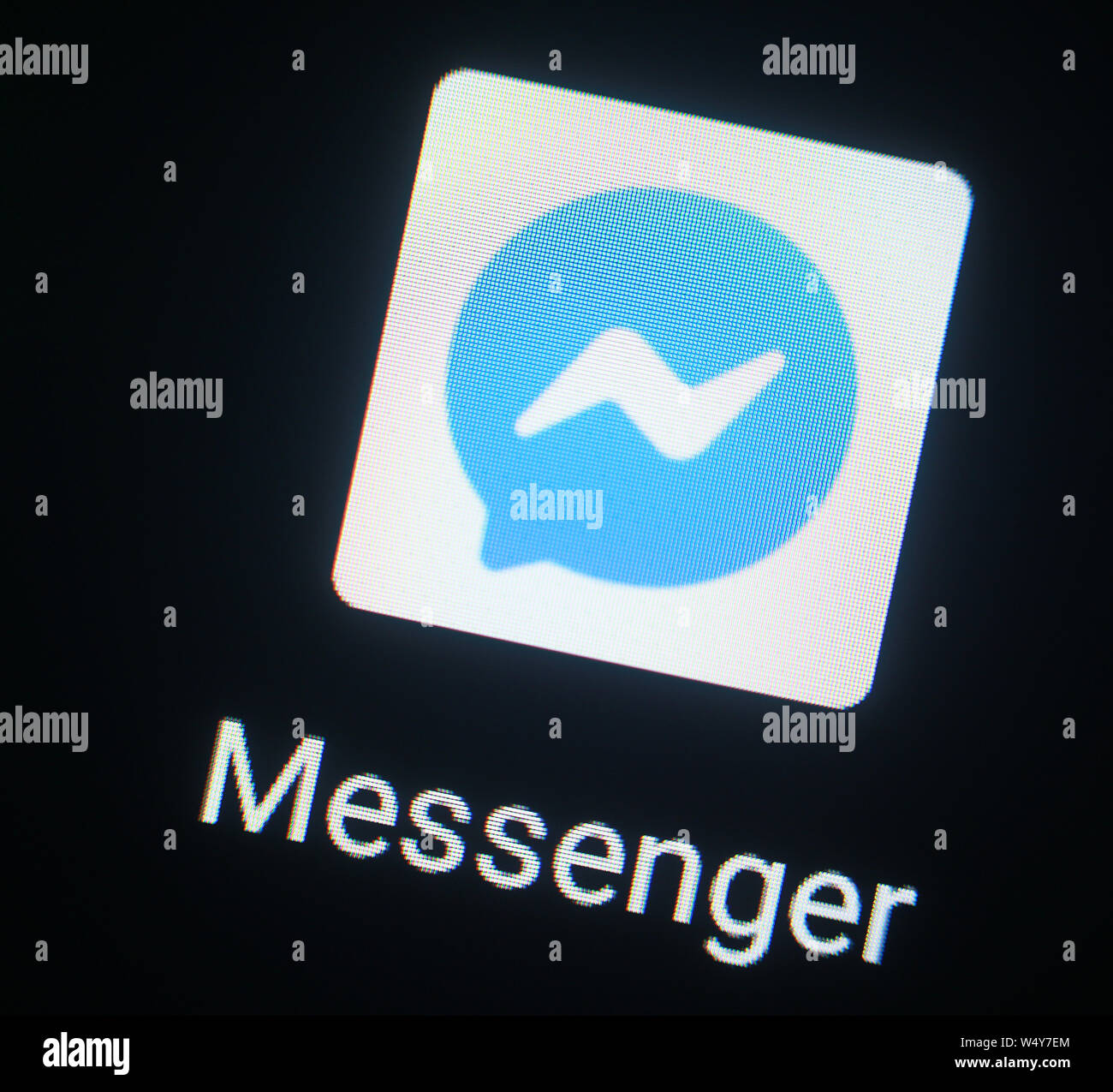 Messenger application icon on computer display Stock Photo - Alamy
