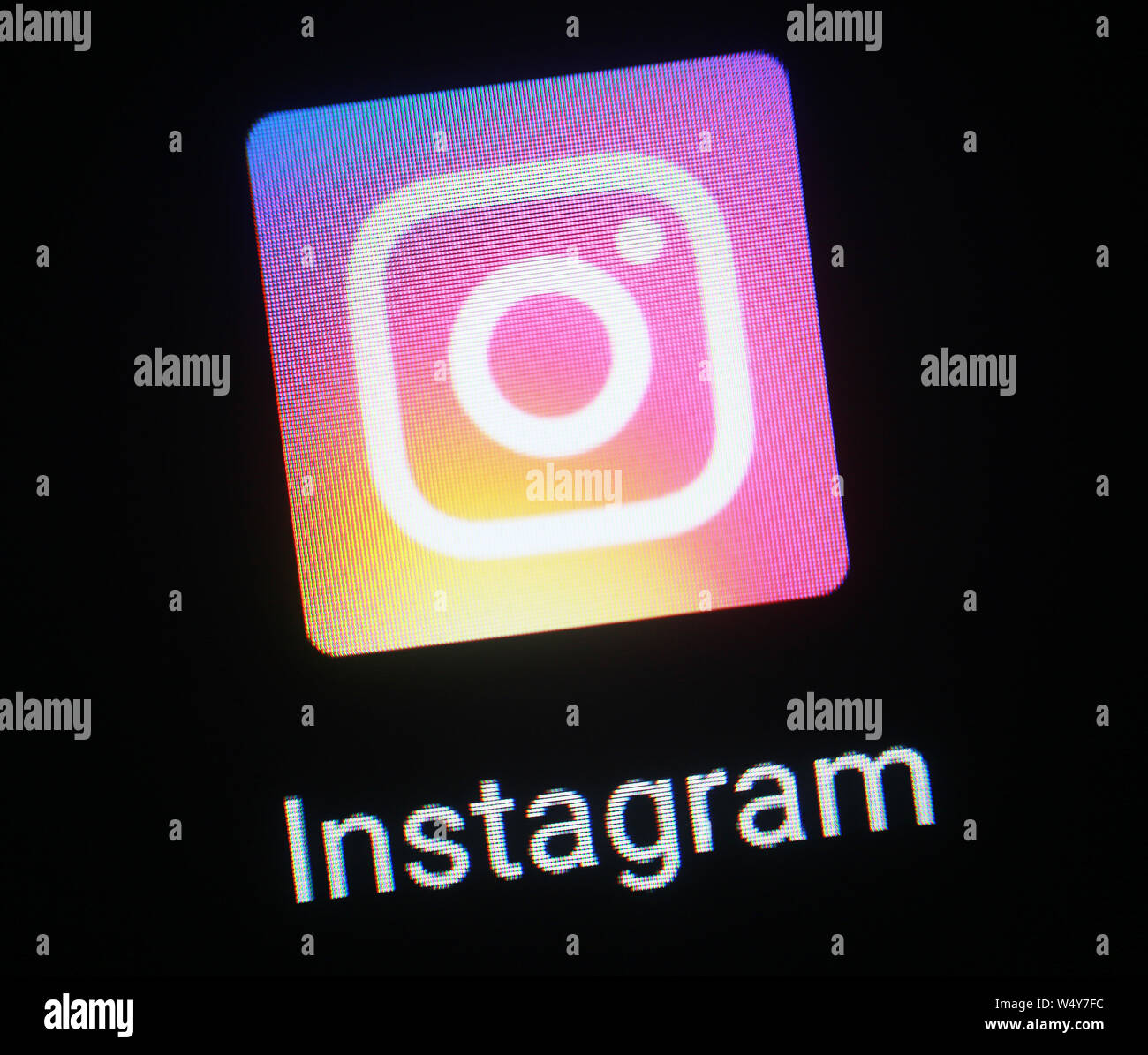 Instagram application icon on computer display Stock Photo - Alamy