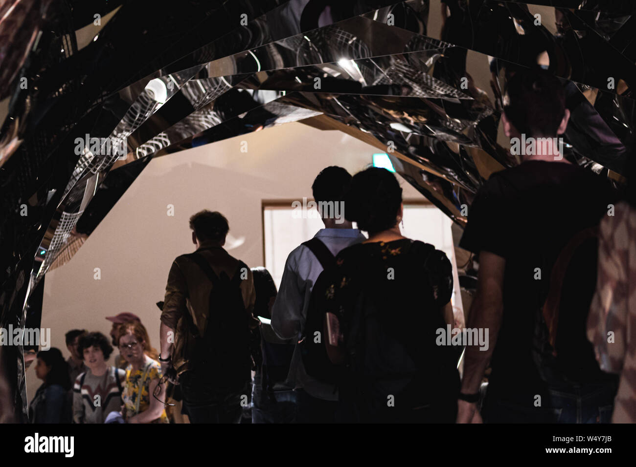 Tunnel of fragmented mirrors that reflect people - Olafur Eliasson ...