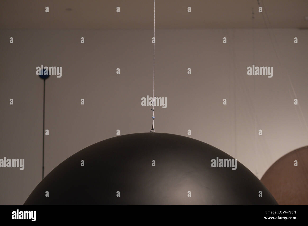 Massive black orb spherical sculpture - Takis exhibition - Tate Modern ...