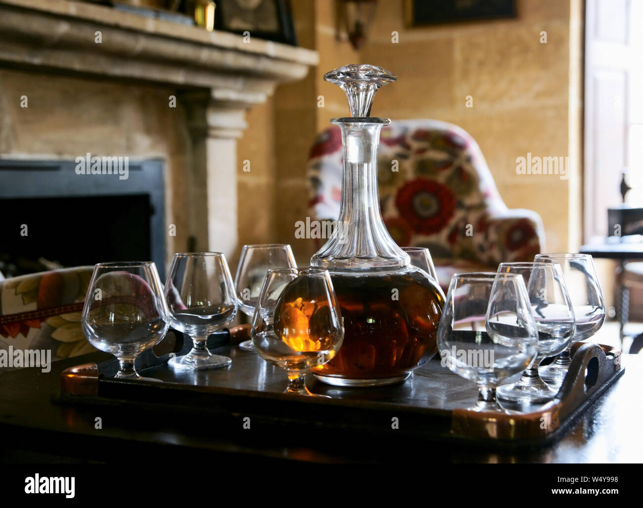 Table served with cognac in an aristocratic chateau Stock Photo - Alamy