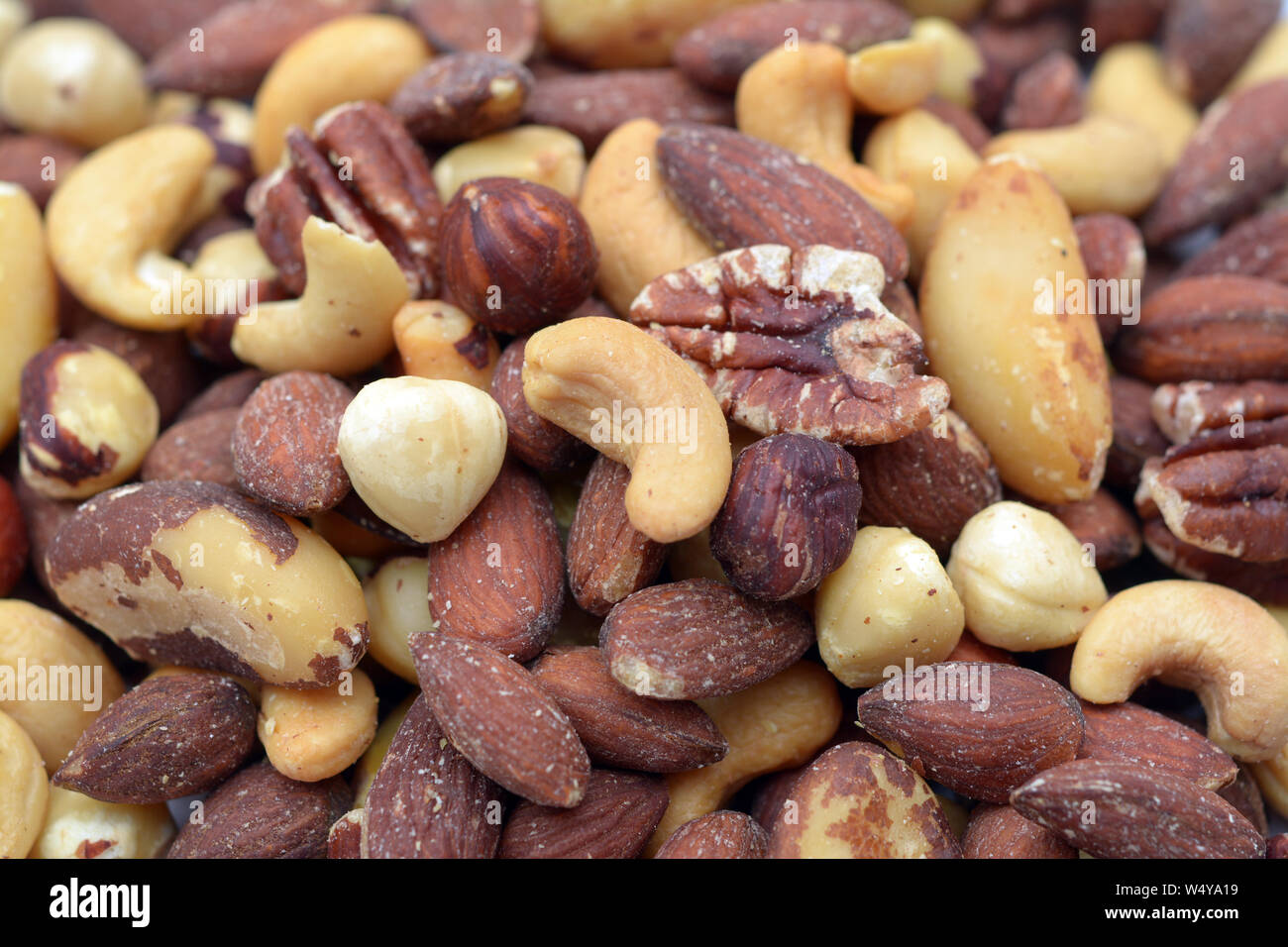 Mix nuts for background uses Stock Photo - Alamy