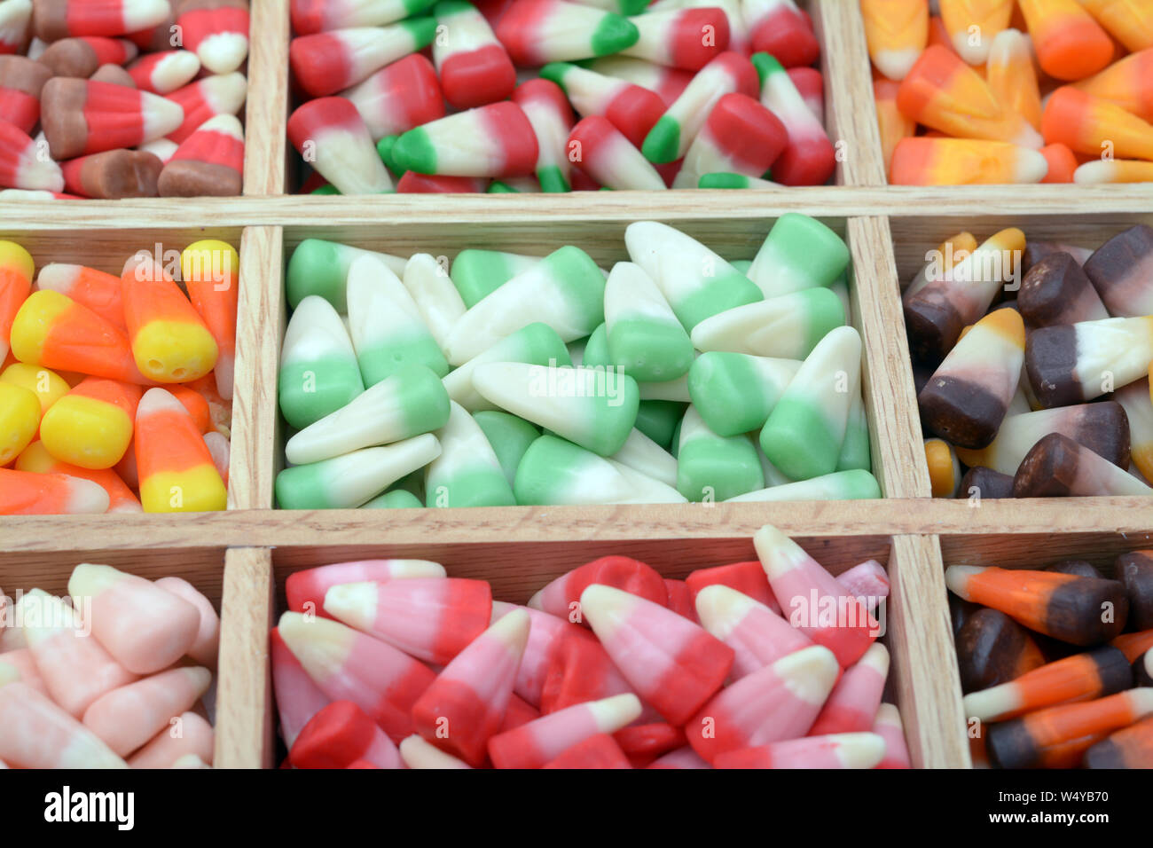 Tooth candies on wooden tray Stock Photo - Alamy