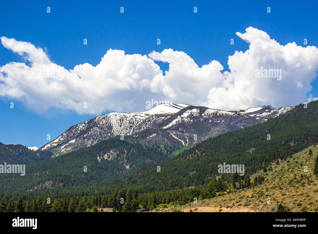 Snow Capped Sierra Nevada Mountains In Spring Stock Photo - Alamy
