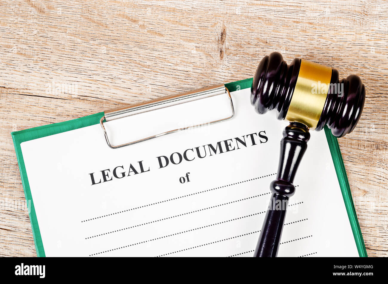 Legal document paper file with gavel on wooden background Stock Photo ...
