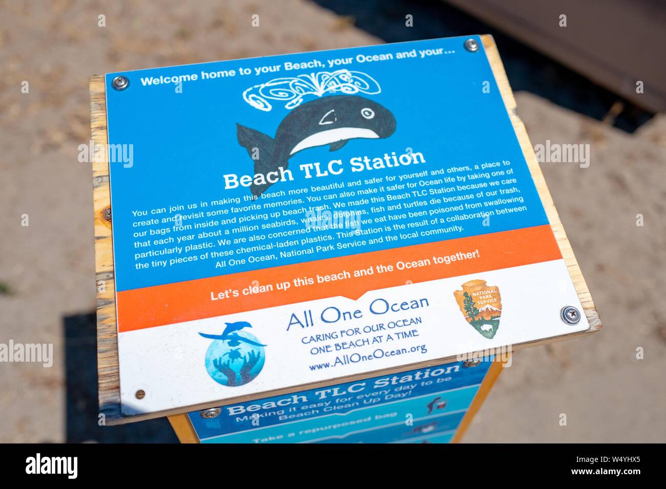 Close-up of a Beach TLC station, providing instructions for visitors to ...