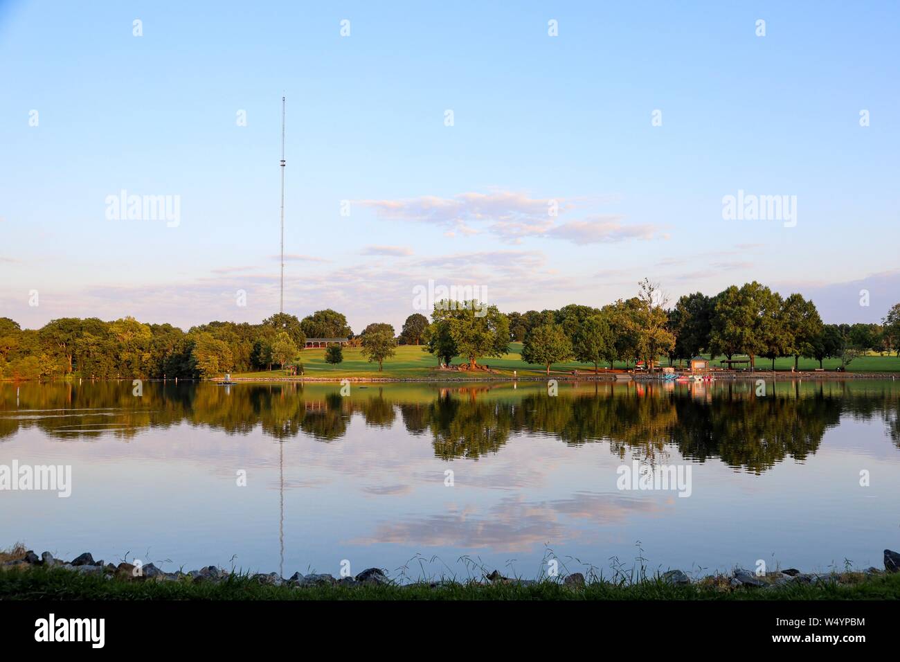 A lake in front of a park at sunset in Concord North Carolina Stock ...