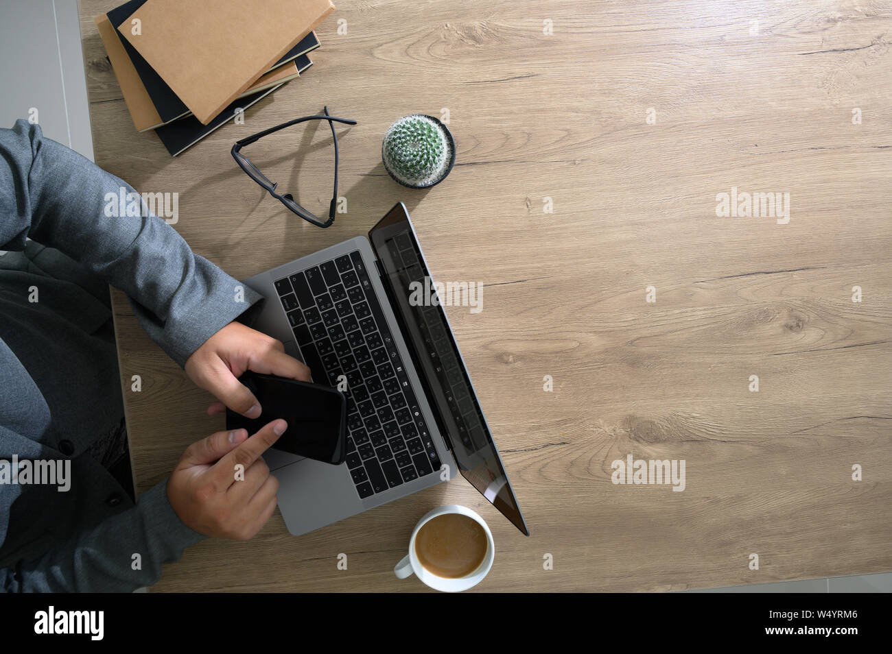 Overhead view of Hands that were made to work using a computer Stock ...