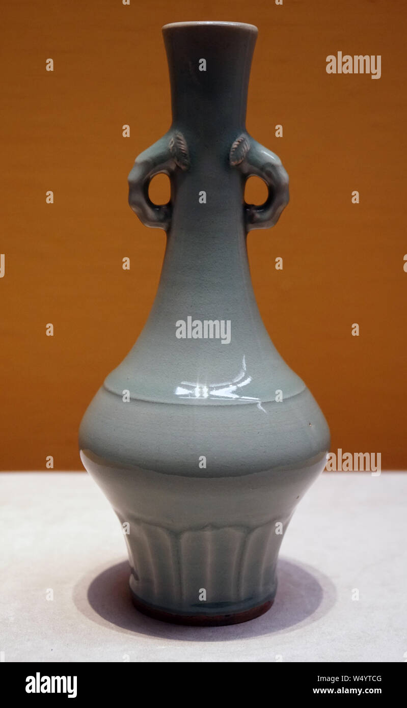 Flower vase with elephant shaped handles, stoneware with celadon glaze ...