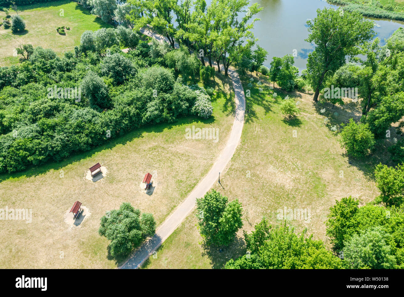 aerial top view of park landscape in summer. green lawns and trees ...
