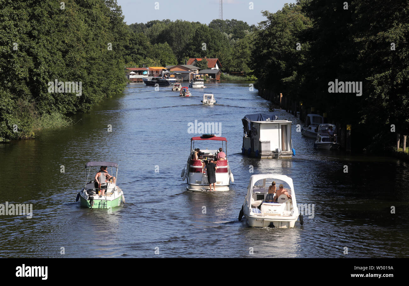 Mirow, Germany. 23rd July, 2019. Motor boats and houseboats leave the ...