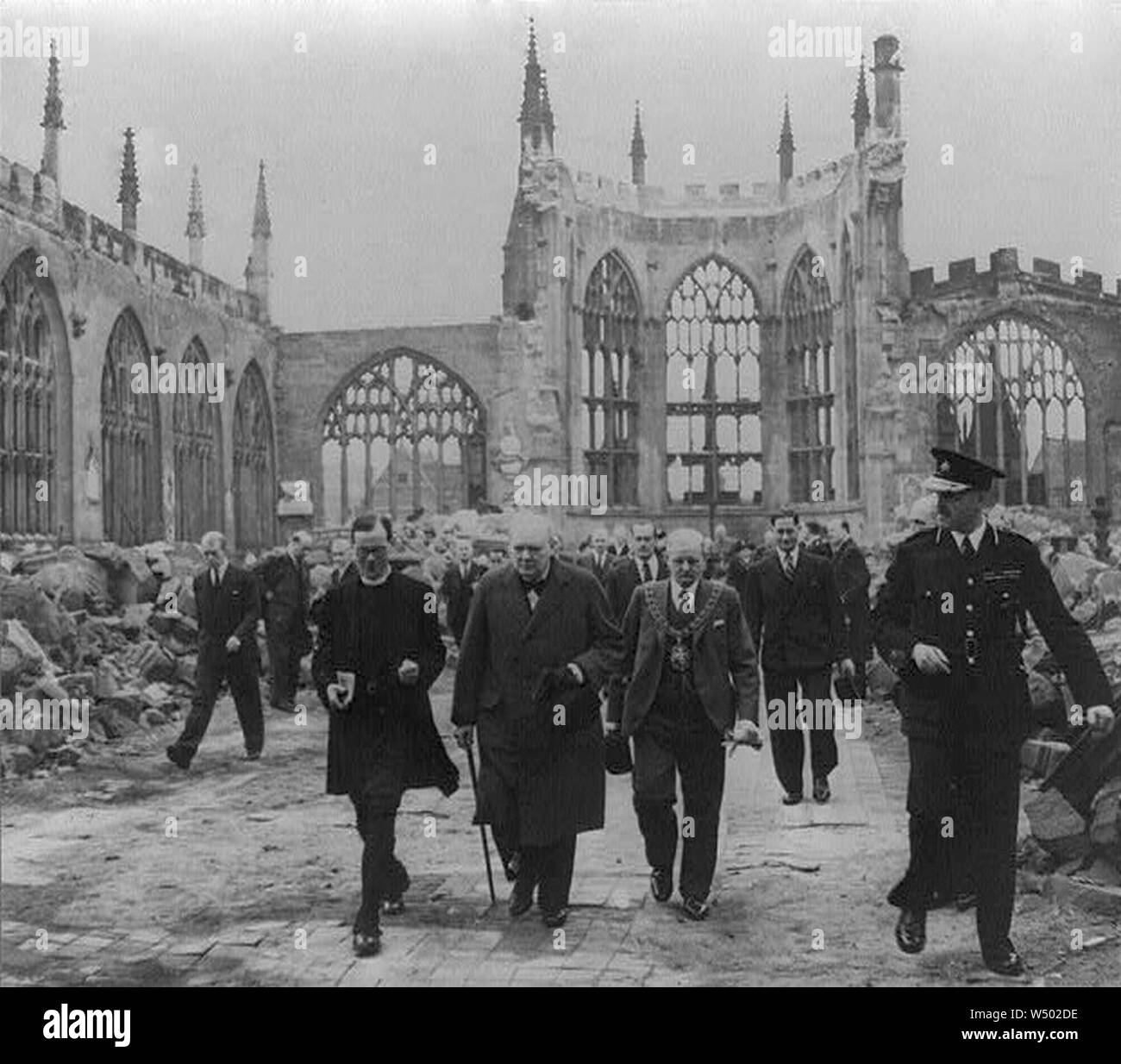Winston Churchill walks through the ruins of Coventry Cathedral Stock ...