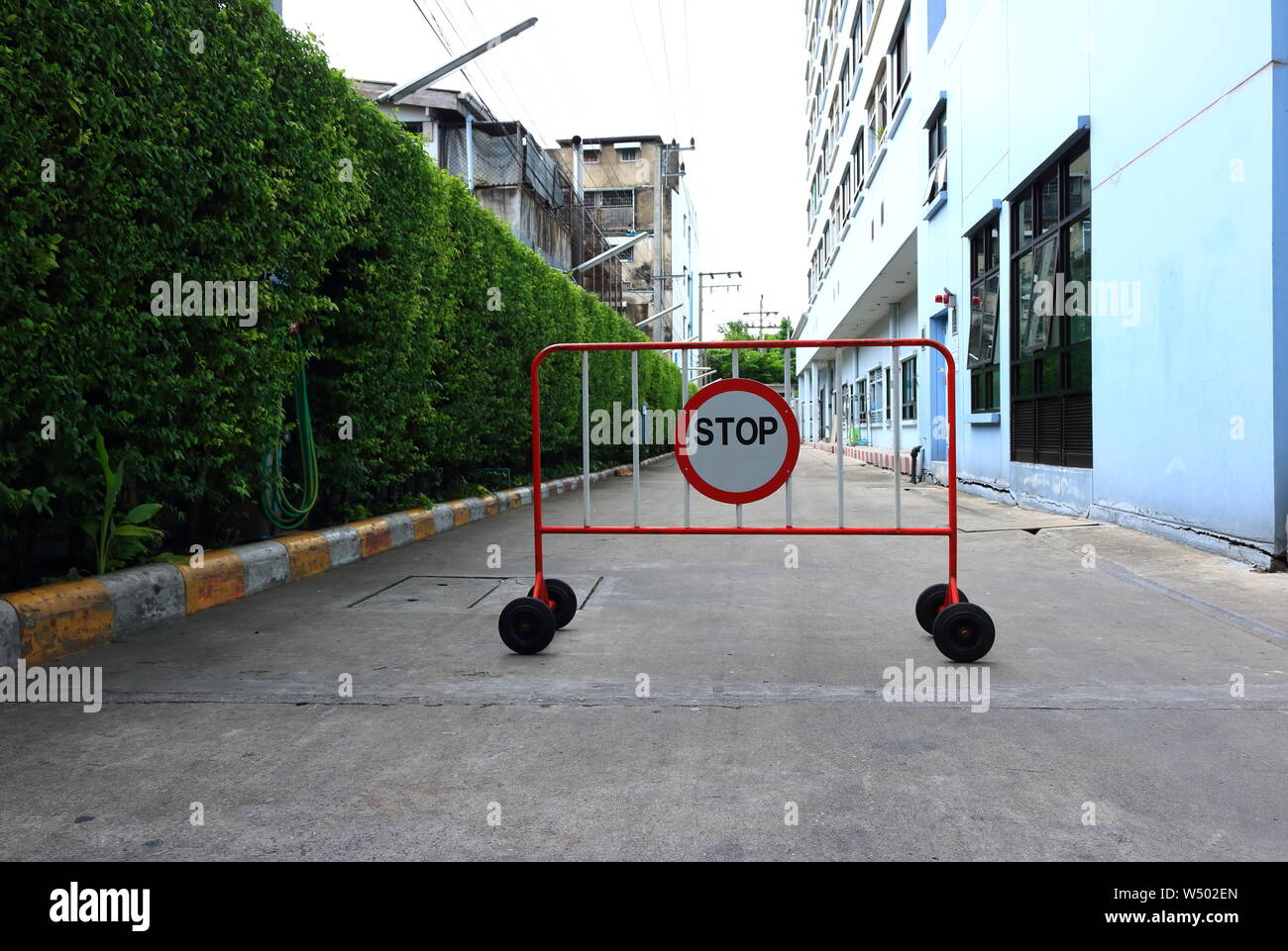 Closeup of stop sign standing on street, safety concept Stock Photo - Alamy
