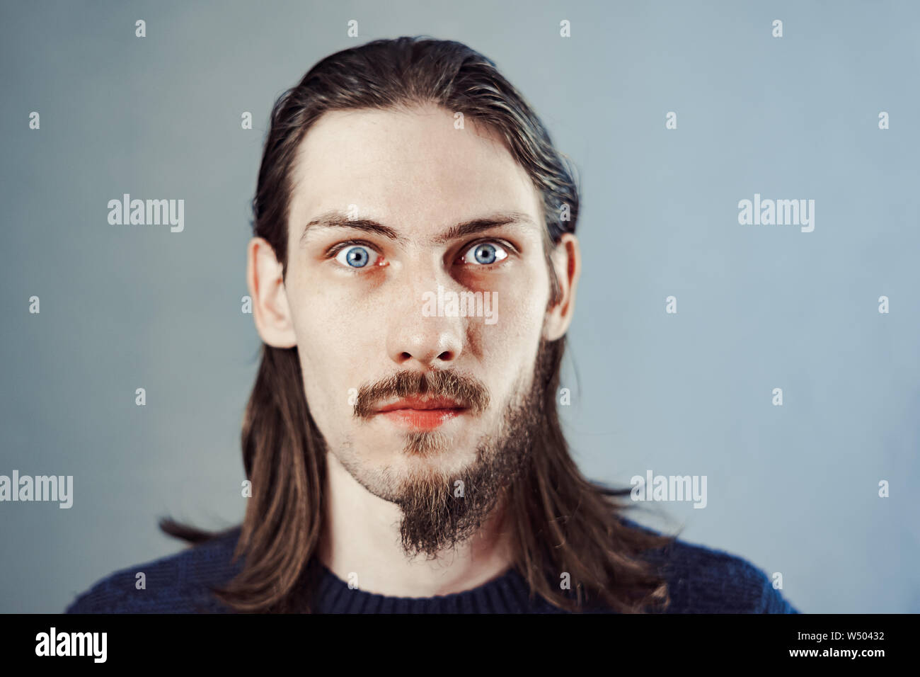 the guy with the long hair and the half-face beard Stock Photo - Alamy