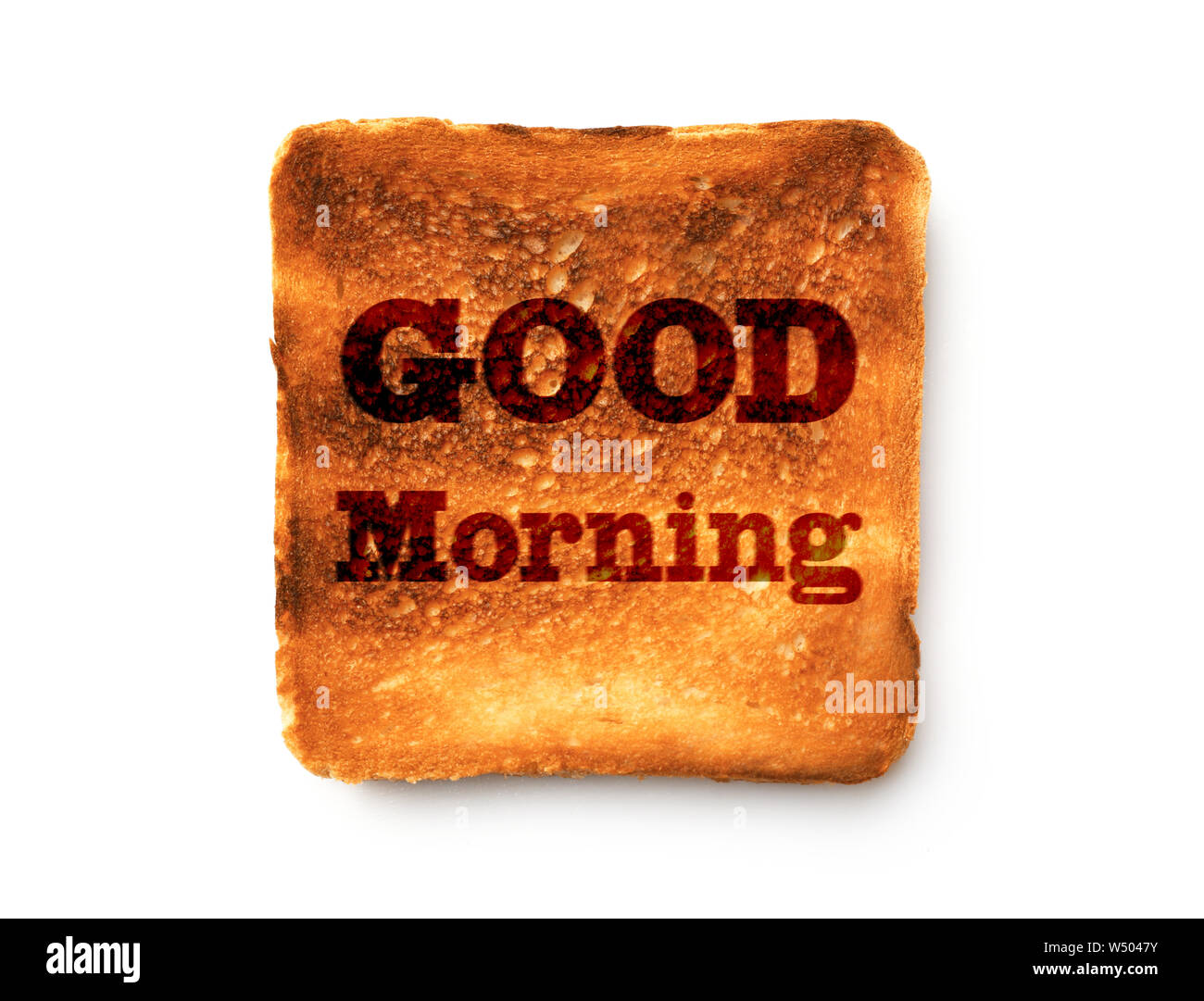 Slice of toasted bread with inscription GOOD MORNING on white ...