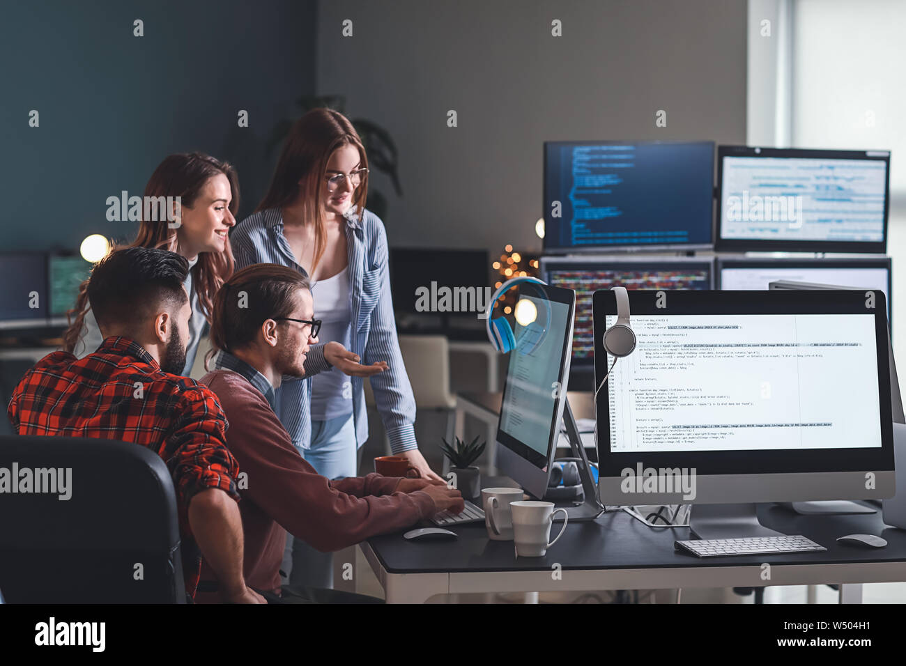 Team female programmers working hi-res stock photography and images - Alamy