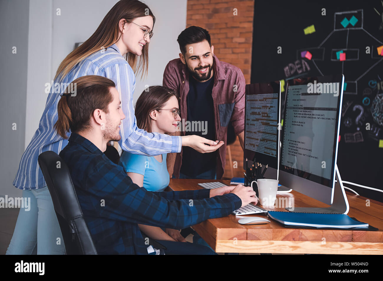 Female programmers working table hi-res stock photography and images - Alamy
