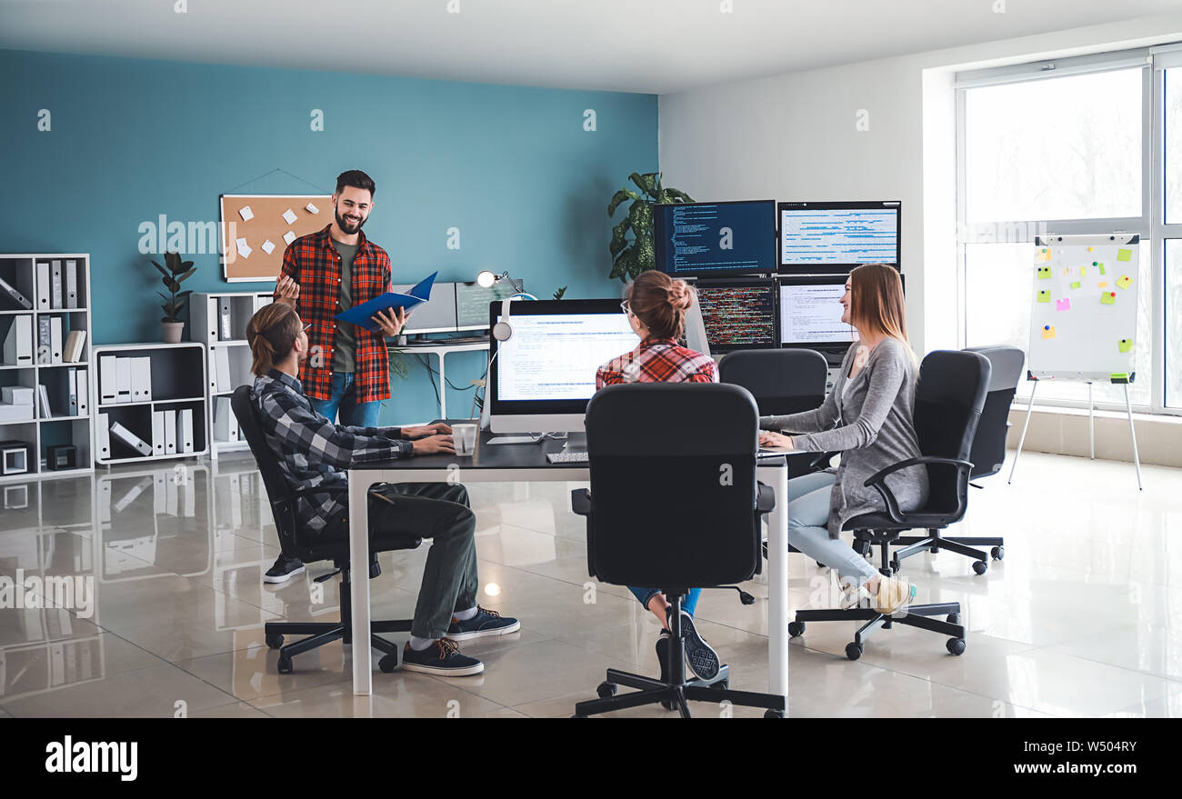 Female programmers working table hi-res stock photography and images ...