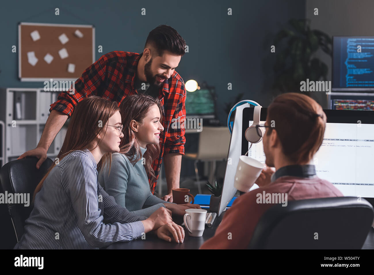 Female programmers working table hi-res stock photography and images ...