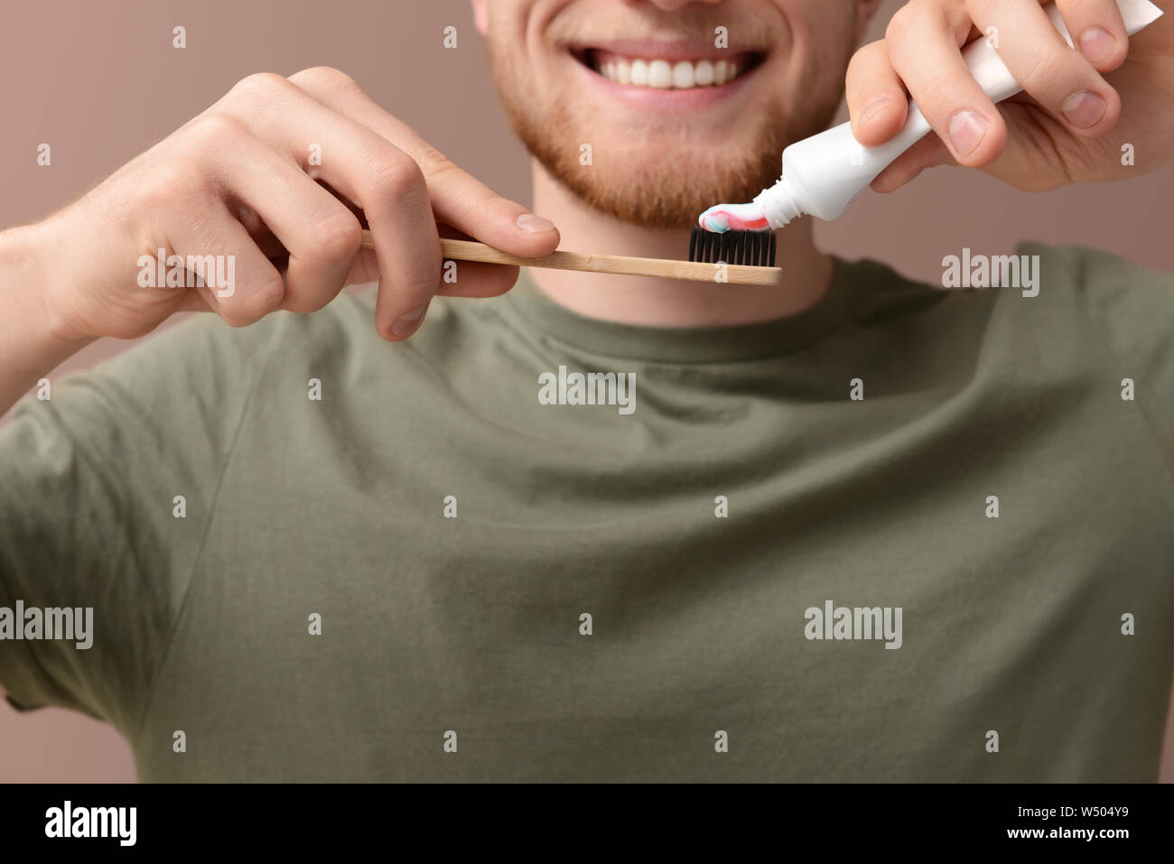 Young man cleaning teeth hi-res stock photography and images - Alamy