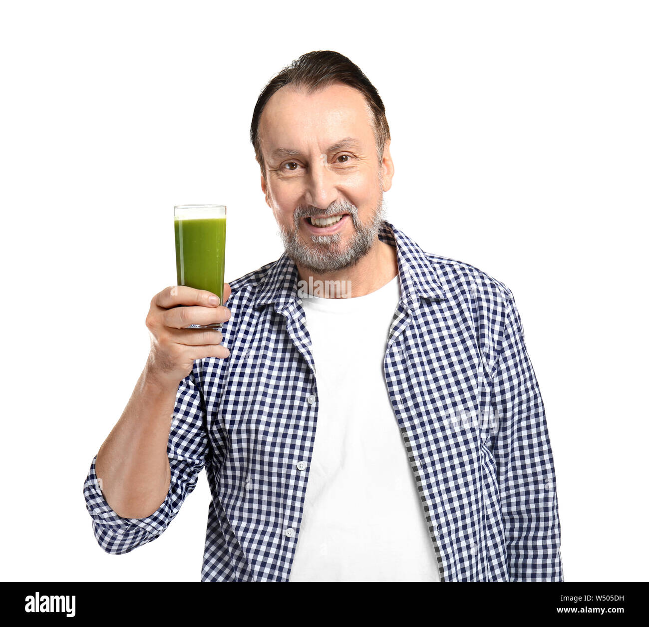 Portrait of handsome mature man with healthy juice on white background ...