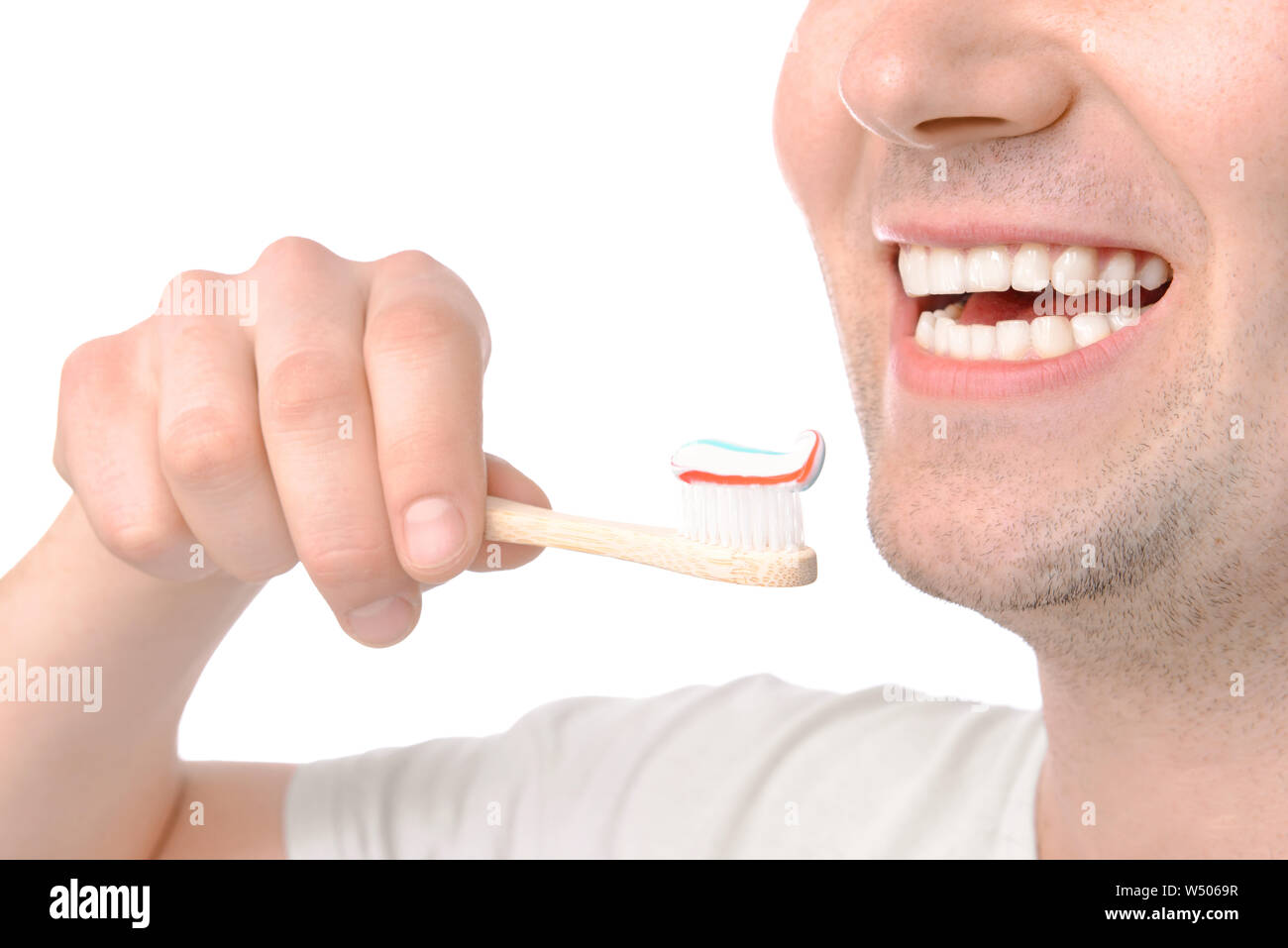 Man with toothbrush on white background, closeup. Concept of dental ...