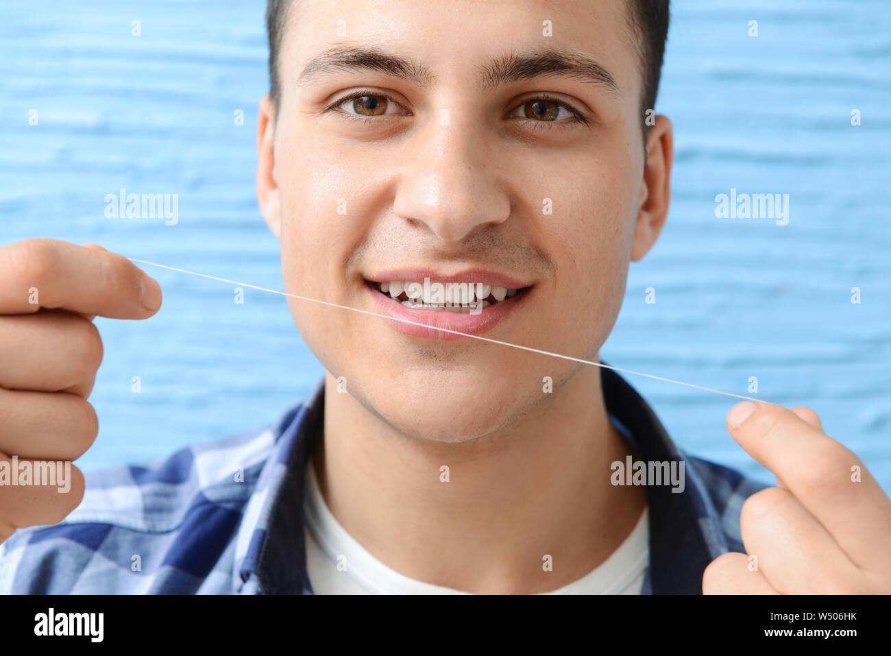 Dental floss on color hi-res stock photography and images - Alamy