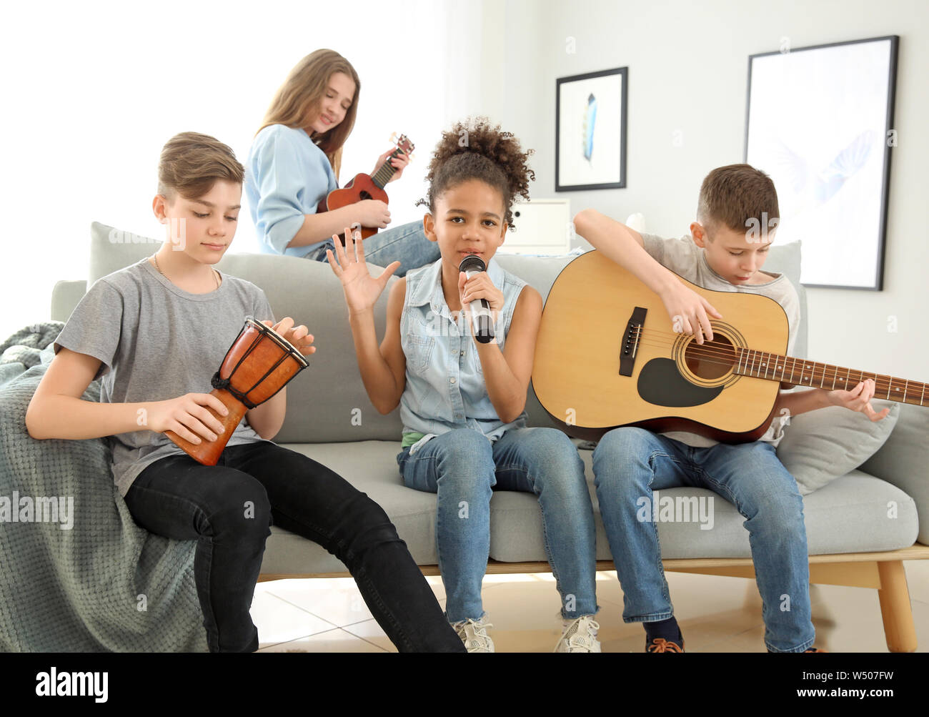 Afro teen girl guitar hi-res stock photography and images - Alamy