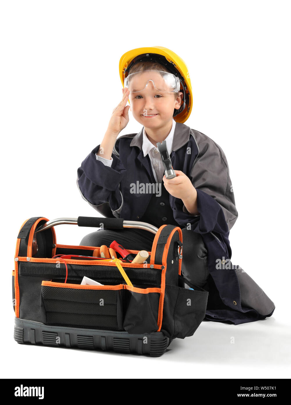 Cute little mechanic on white background Stock Photo - Alamy